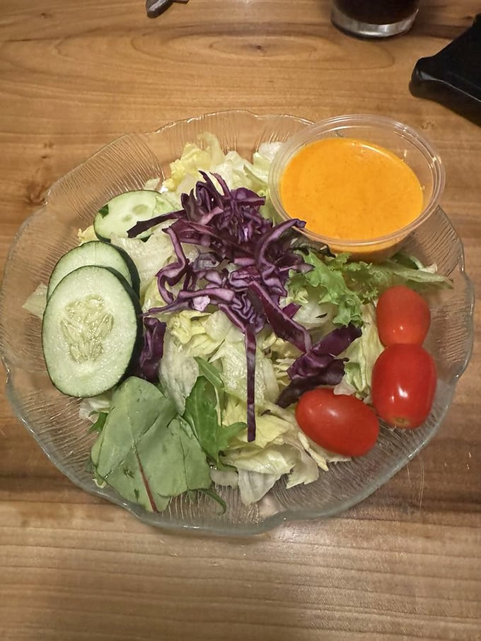 A garden salad that actually deserves its name – fresh, colorful, and the perfect opening act before the meaty main event.