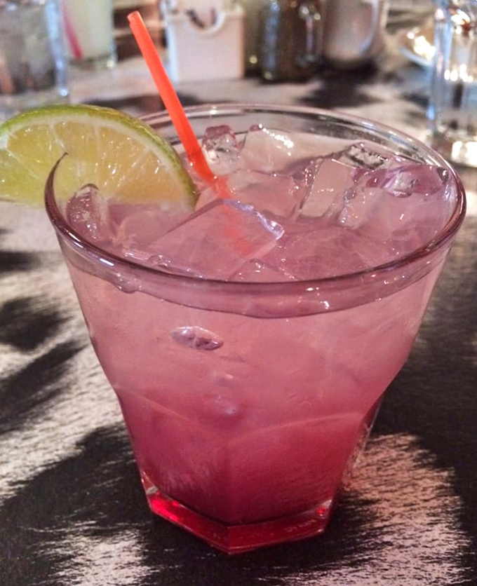 This isn't just any cocktail—it's a Huckleberry Margarita that captures Oregon in a glass. That lime isn't garnish; it's punctuation.