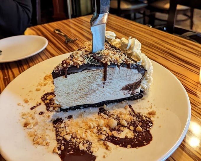 This isn't just dessert – it's architecture, art, and pure indulgence stacked in layers that demand to be demolished.
