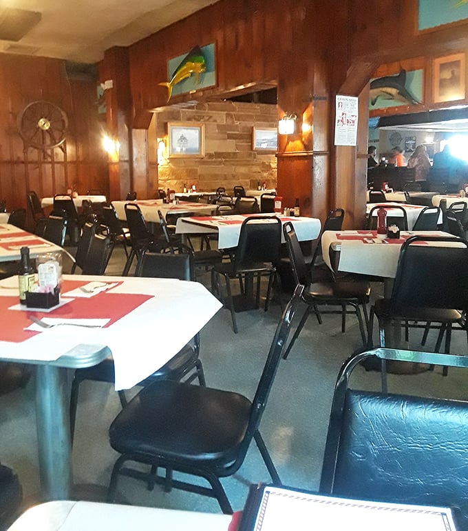 The dining room feels like your seafood-loving uncle's basement—if your uncle happened to be a retired sea captain with excellent taste in comfort.