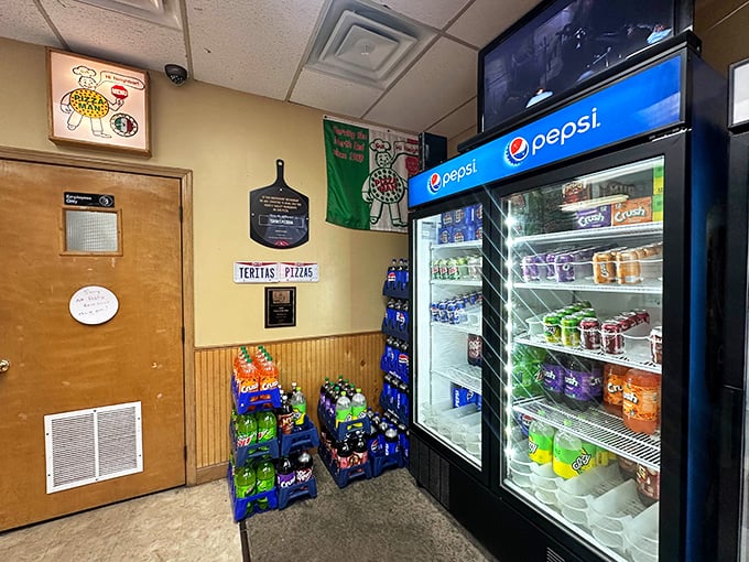 No Edison bulbs or reclaimed wood here—just honest pizza parlor aesthetics where function leads form and nostalgia comes complimentary with every order.