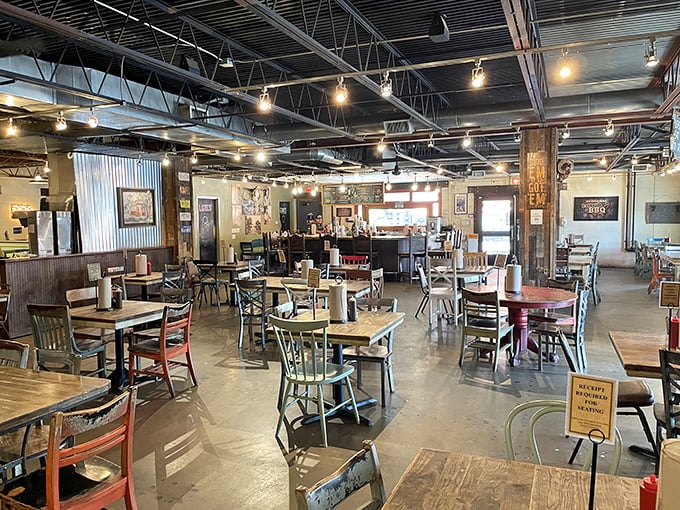 The dining room feels like a community gathering spot where strangers become friends, united by their mutual love of exceptional BBQ.