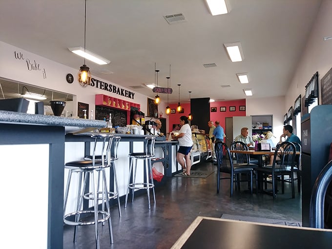 The café's interior balances rustic charm with modern efficiency – a place where conversations flow as easily as the coffee.