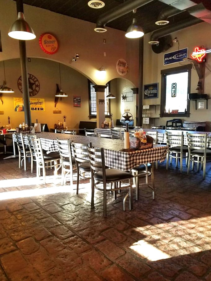 The dining room feels like your favorite uncle's Texas basement – if that basement specialized in life-changing barbecue experiences.