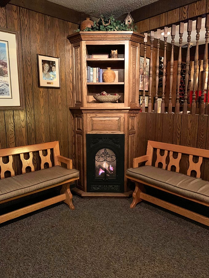 This cozy corner with its fireplace feels like grandpa's den, if grandpa had excellent taste in furniture.
