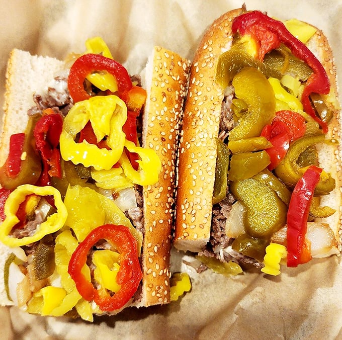 This pepper-topped masterpiece isn't just a sandwich—it's edible architecture where each colorful layer adds both structure and flavor.