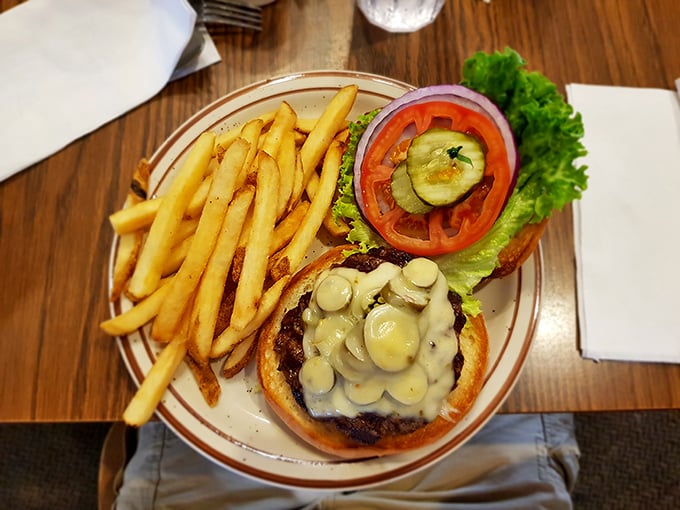 A Jalapeno burger that requires strategic planning before the first bite. Those mushrooms aren't just toppings—they're co-stars in this delicious production.