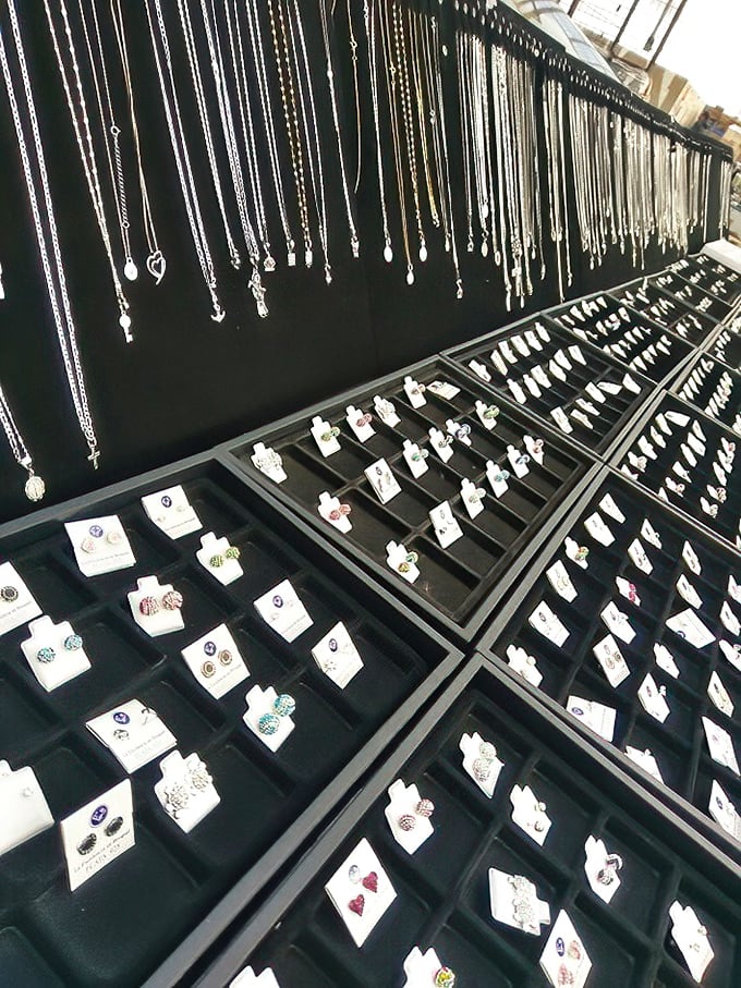 Silver stories hanging in patient rows—each necklace and earring waiting for the right person to continue its journey.