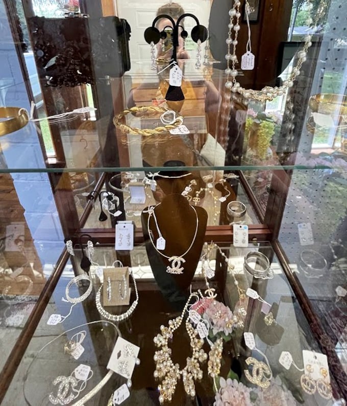 The jewelry case glitters with vintage Chanel and pearls galore—because sometimes the best accessories come with stories instead of return policies. 