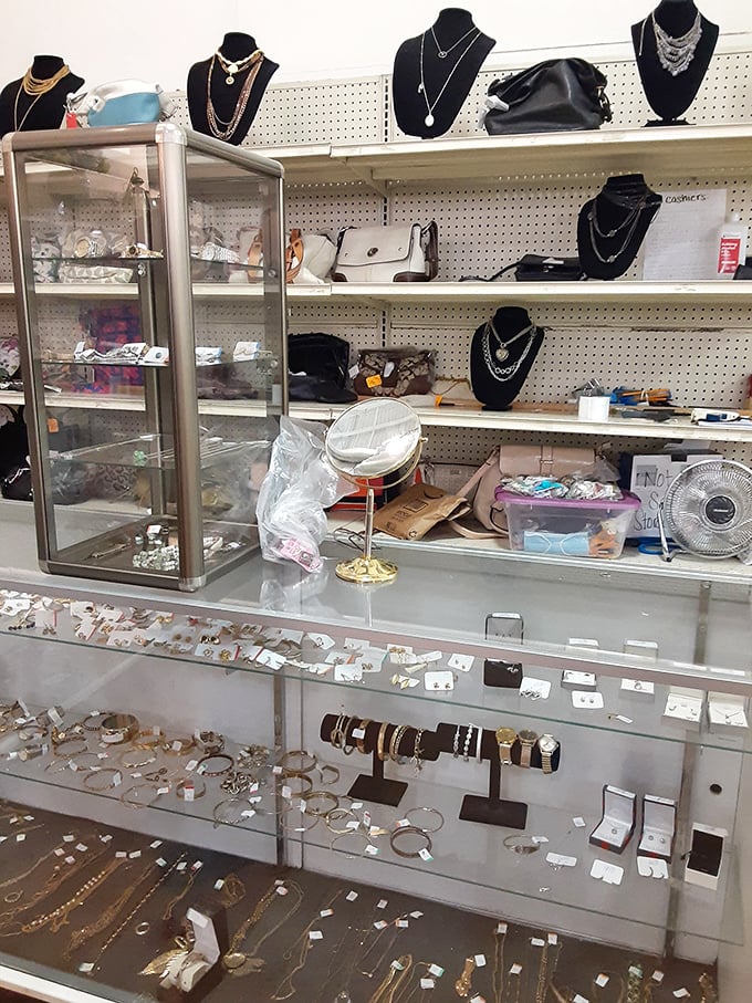 Jewelry display cases glittering with possibility – accessorize your thrift store outfit without breaking your thrift store budget.
