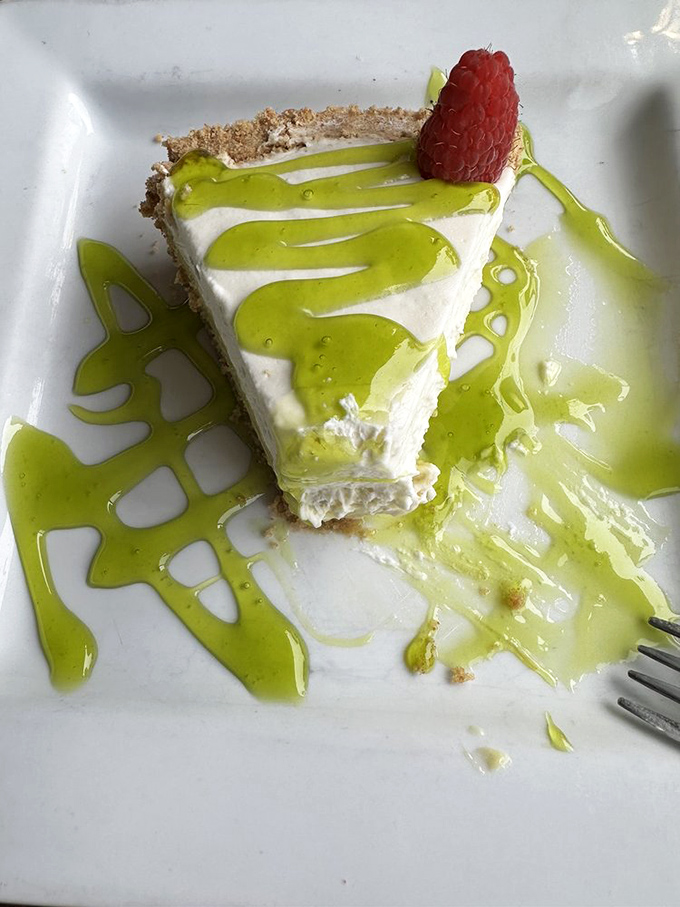 Key lime pie that strikes the perfect balance between tart and sweet, with a presentation that's both artistic and slightly irreverent – just like the best dinner conversations.