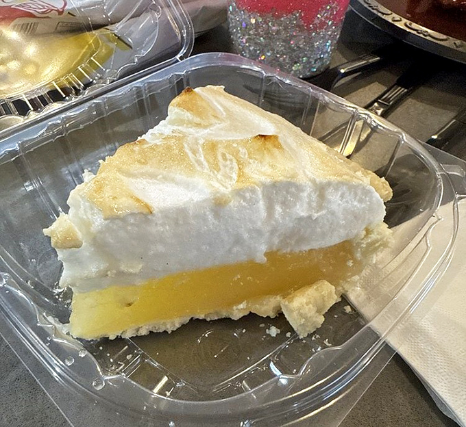 Lemon meringue pie with clouds of toasted meringue floating above bright citrus filling—the perfect sweet-tart finale to a symphony of smoke.