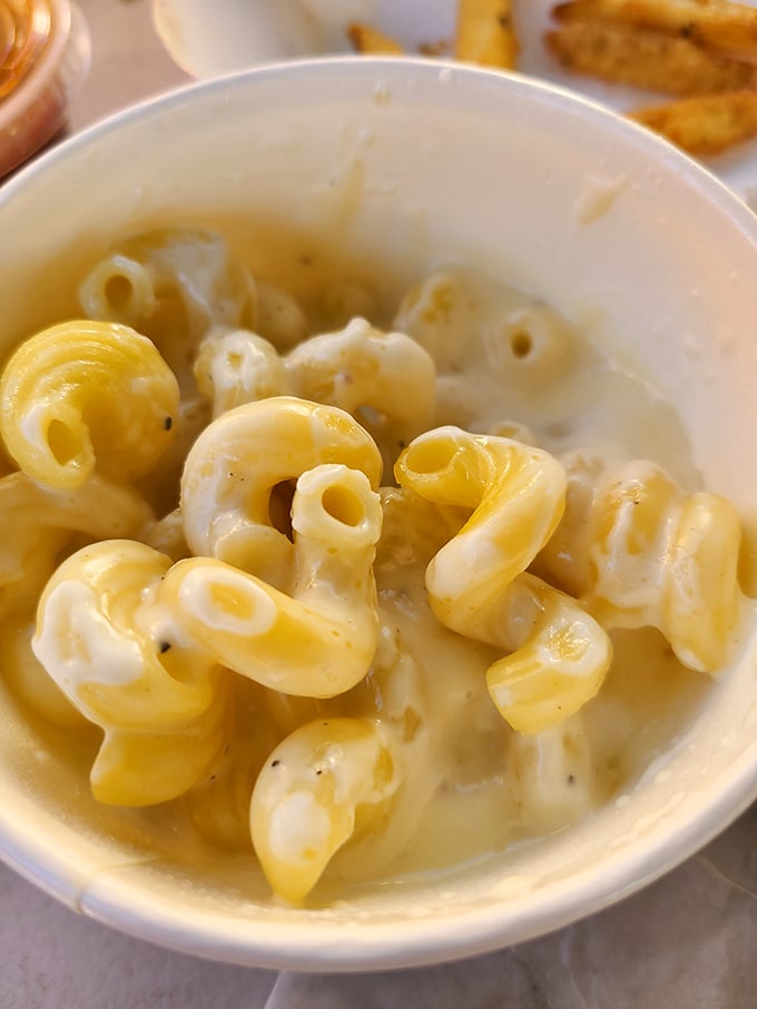 Mac and cheese that achieves that perfect balance between creamy and cheesy—comfort food that makes you want to hug the chef.