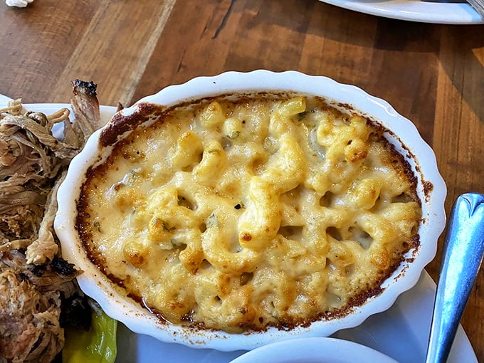 Mac and cheese bubbling with golden perfection—the kind that makes you wonder why anyone bothers with the boxed stuff.