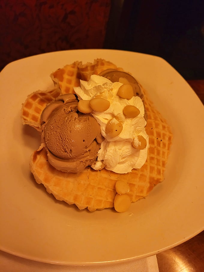 A waffle sundae that doesn't just satisfy your sweet tooth—it throws a party for it, complete with macadamia nuts as the VIP guests.