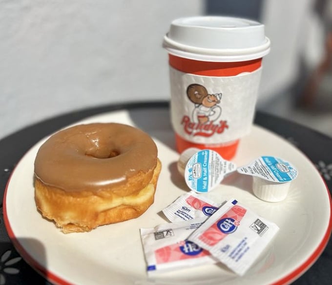 A maple-glazed donut and coffee: the breakfast of champions who know life's too short for green smoothies every day.