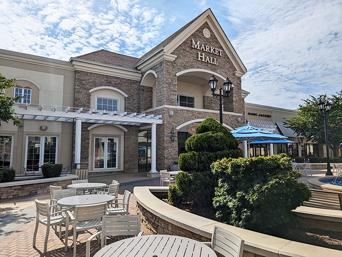 Market Hall's stone facade and outdoor seating create that "I'm-not-in-a-mall" feeling while you're definitely still in a mall.