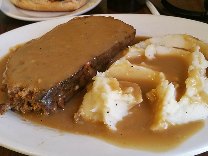 Meatloaf and mashed potatoes swimming in gravy—the comfort food equivalent of a warm hug from your favorite relative who can actually cook.