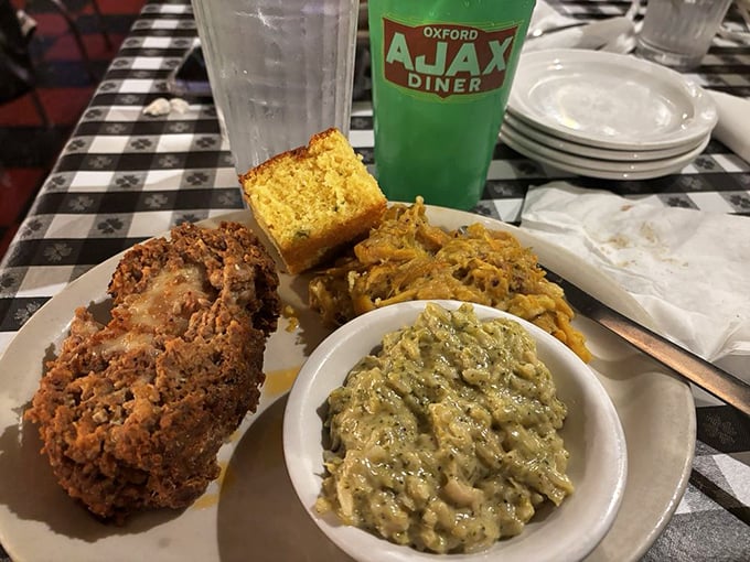 Ajax's meatloaf with that signature cornbread square – proof that the simple things in life, when done right, can be the most extraordinary.