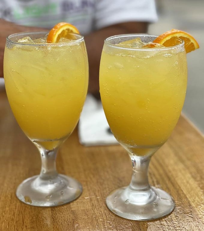 Mimosas bright as the Delaware morning sun, served in unpretentious stemware—because vacation isn't about the glass, it's about what's in it.