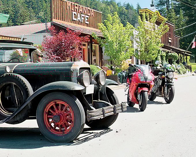 The Miranda Cafe stands as a time capsule where vintage wheels meet modern adventures – road trip nostalgia at its finest.