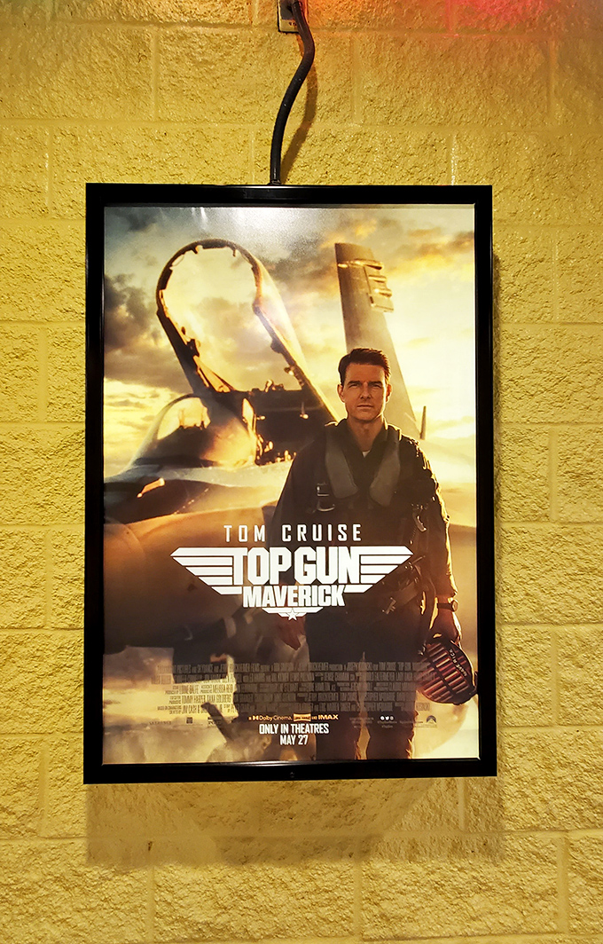 Even Maverick himself would approve of this viewing venue. Movie posters adorn the walls, building anticipation for the evening's feature presentation.