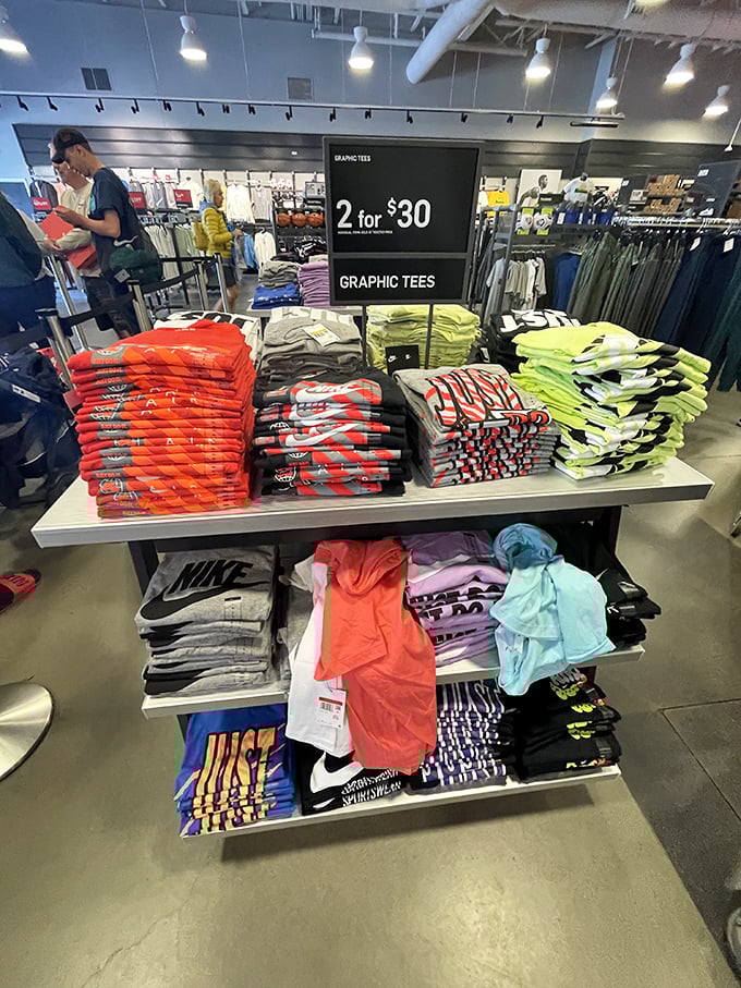 Graphic tees stacked in rainbow formations make choosing just one color an unexpectedly difficult life decision.