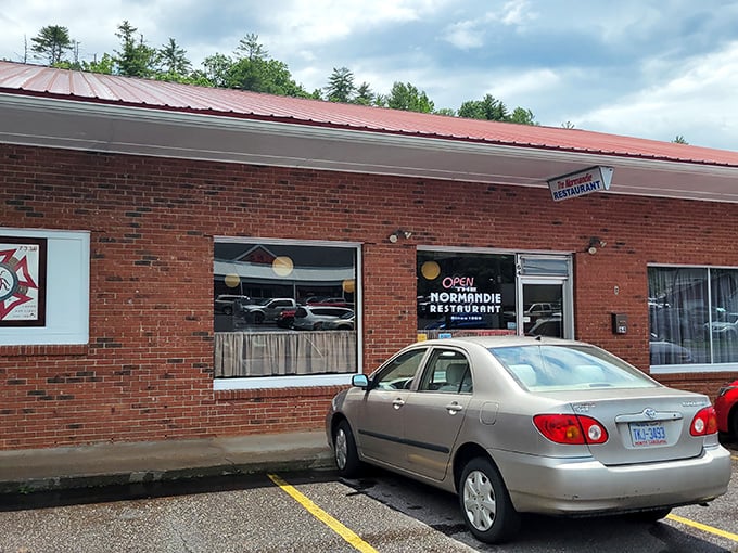 The unassuming exterior of Normandie Restaurant hides what locals know – sometimes the best meals come from places that spent their budget on food rather than fancy facades.