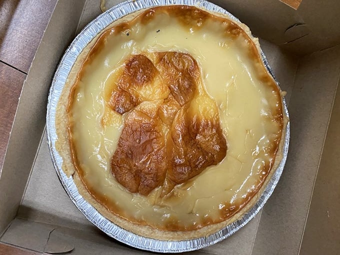 Cream pie that would make Andy Griffith stop mid-whistle. That golden top isn't just a color – it's a promise of deliciousness.