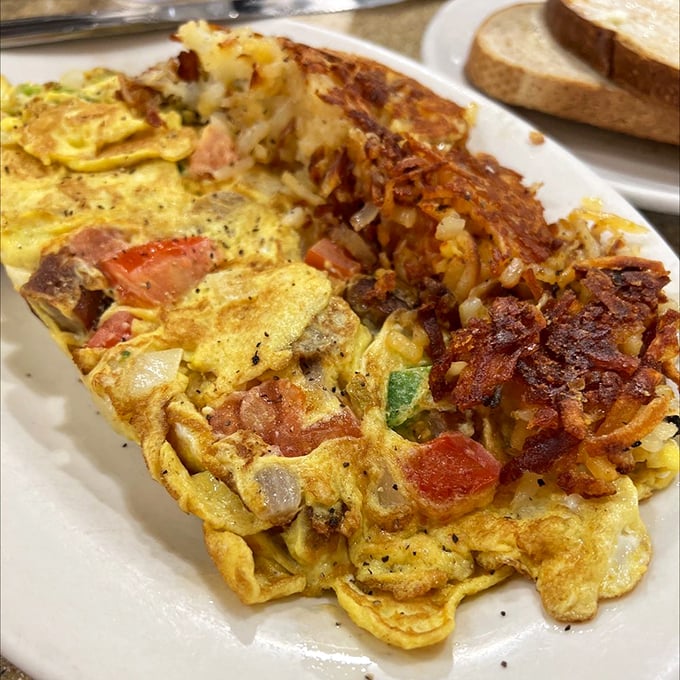 The Western omelet and home fries combo—where breakfast meets art, and your fork becomes the happiest tool in Philadelphia.