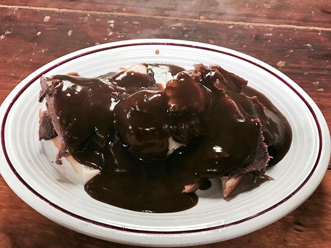 Open-faced hot beef sandwich swimming in gravy so good you'll want to dive in after it. Comfort food that hugs your soul.
