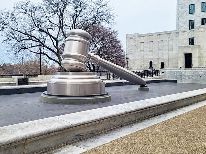 Winter's bare branches frame this metallic giant perfectly. The gavel stands ready to bring order to Columbus, even when the trees have called a recess for the season.