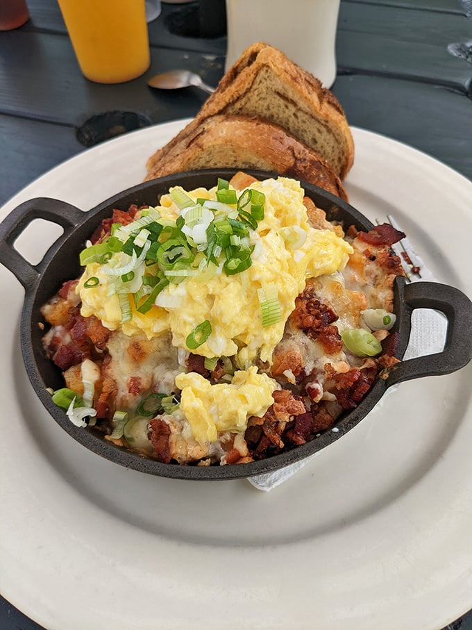 Breakfast skillet perfection—where potatoes, eggs, bacon, and green onions gather for a morning party that your taste buds are definitely invited to.