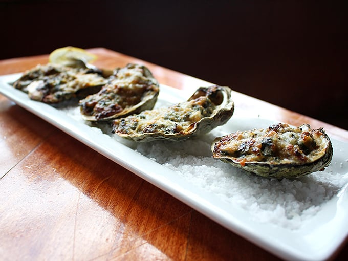 These oysters aren't just appetizers—they're briny jewels of the Chesapeake, transformed by fire, cheese, and culinary magic.