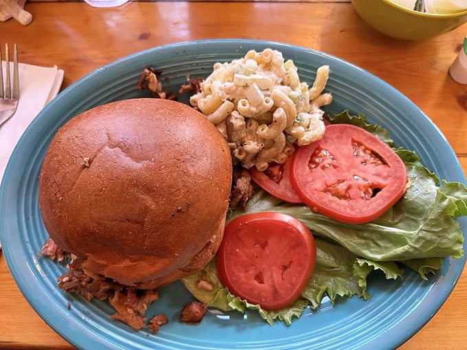 A sandwich that deserves its own ZIP code – hearty, handcrafted, and served on what might be the best homemade bun in Colorado.