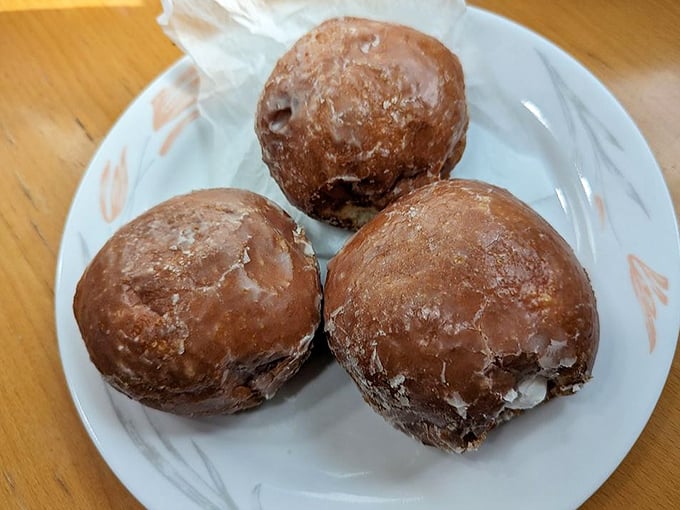 These paczki aren't just donuts—they're Polish pastry perfection that people line up around the block for every Fat Tuesday.