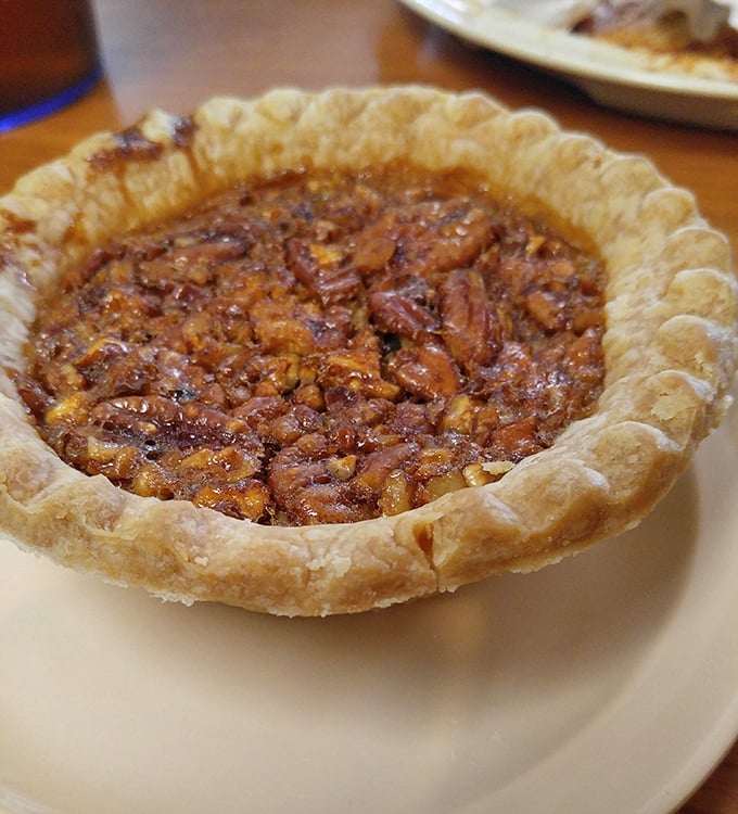 This pecan pie isn't just dessert—it's the sweet, gooey finale to a barbecue symphony that hits all the right Southern notes.