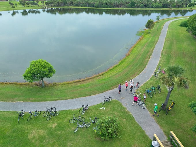 Paved trails around serene lakes draw cycling enthusiasts and walkers alike—retirement fitness programs with panoramic views instead of gym walls.