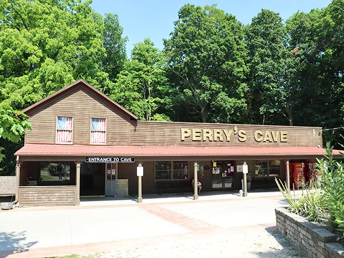 Underground adventure calling! Perry's Cave entrance beckons explorers to discover the limestone labyrinth and crystal-clear underground lake below.