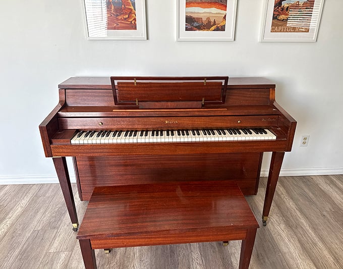A piano that's probably played more living room concerts than Carnegie Hall, ready for an encore performance.