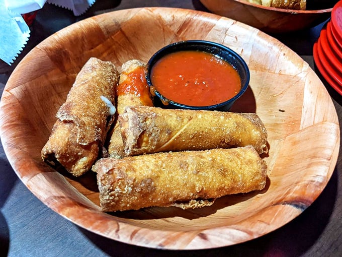 Pizza rolls that make the frozen variety weep with inadequacy – crispy, golden shells guarding molten cheese treasures within.