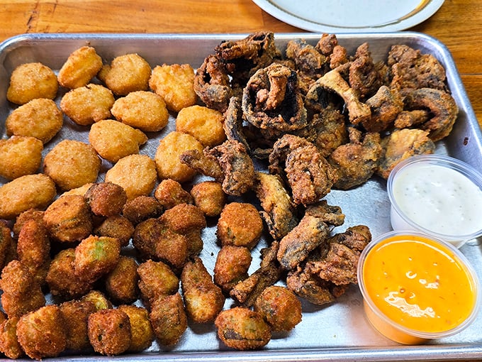 This platter of golden-fried goodness isn't just appetizers—it's a support group for people who believe calories don't count during vacation.