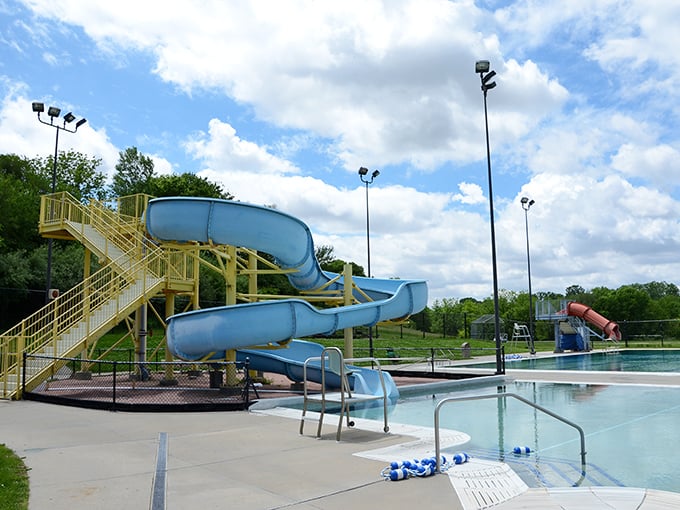 Summer splashes and childhood laughter echo around the community pool, where water slides promise the kind of simple joy that never goes out of style.