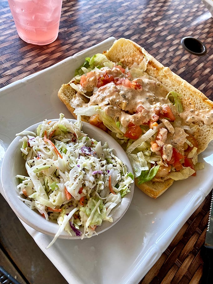 A sandwich that requires both hands and several napkins – the kind of delicious mess that vacation memories are made of.