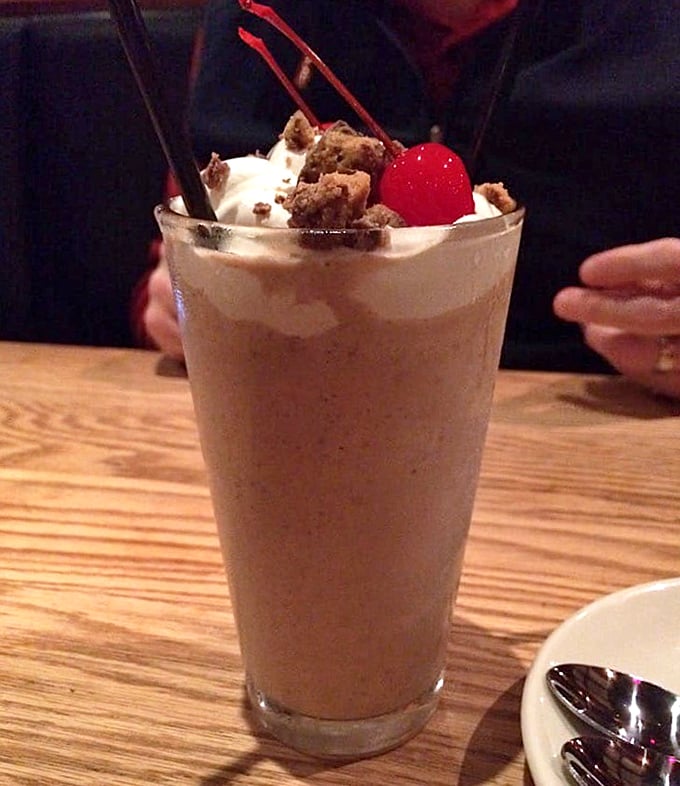 This isn't just a milkshake—it's dessert architecture with a cherry on top and enough chocolate to cure what ails you.