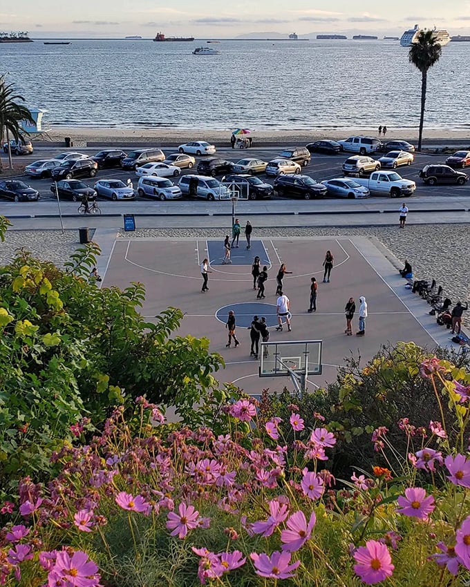 Beach basketball courts where the ocean breeze provides natural air conditioning and the backdrop beats any gym's painted walls.