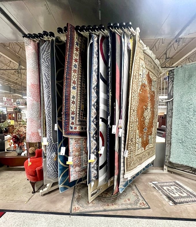 The rug display—where floor coverings from around the world hang like textile art, waiting to anchor your room in style.