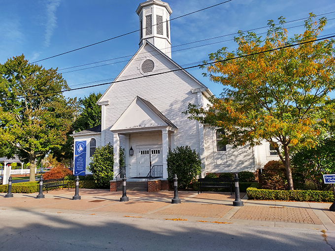 A simple white steeple framed by autumn trees—quintessential Americana. Saint Mary Catholic Parish has quietly anchored the community through generations of change.