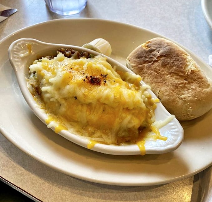 This shepherd's pie isn't just comfort food—it's therapy in a ceramic dish, topped with cheese that's achieved that perfect golden-brown bubble.