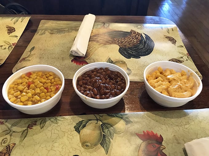 Three perfect sides lined up like old friends at a reunion. Corn, beans, and mac and cheese—the holy trinity of comfort.